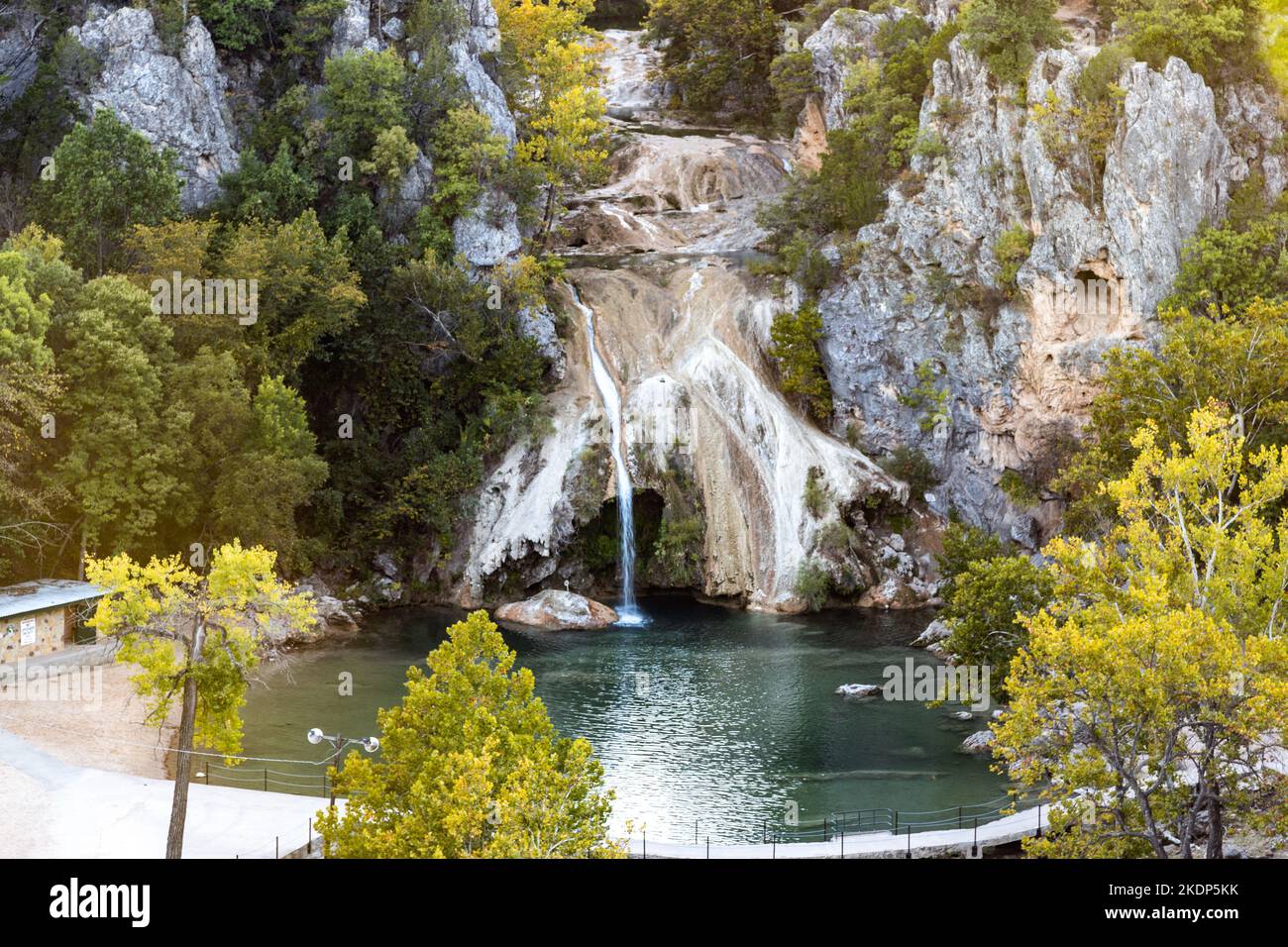 Aerial view of water cascading over rocks into a natural pool at Turner ...