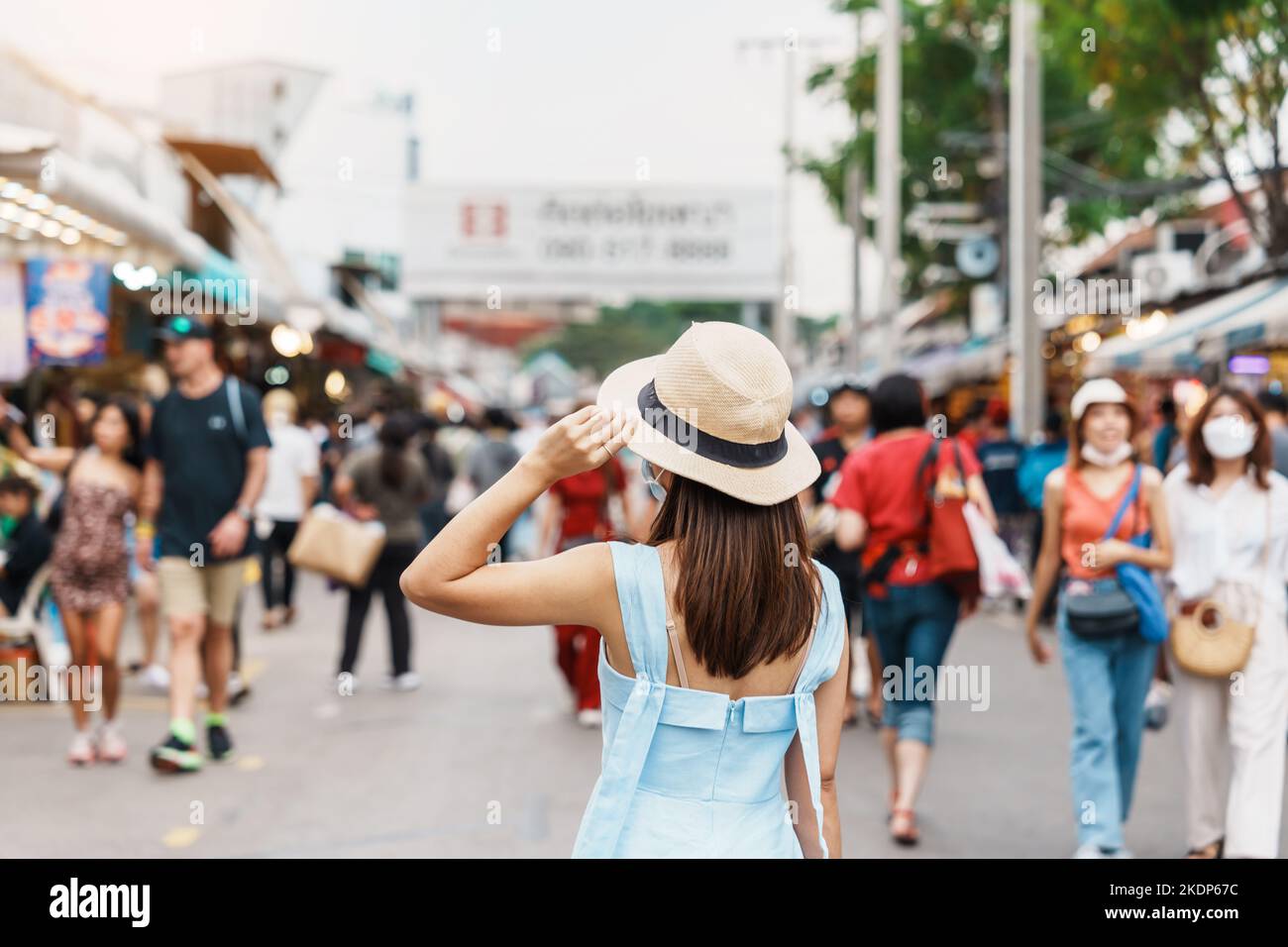 woman traveling with hat, Asian traveler standing at Chatuchak Weekend ...