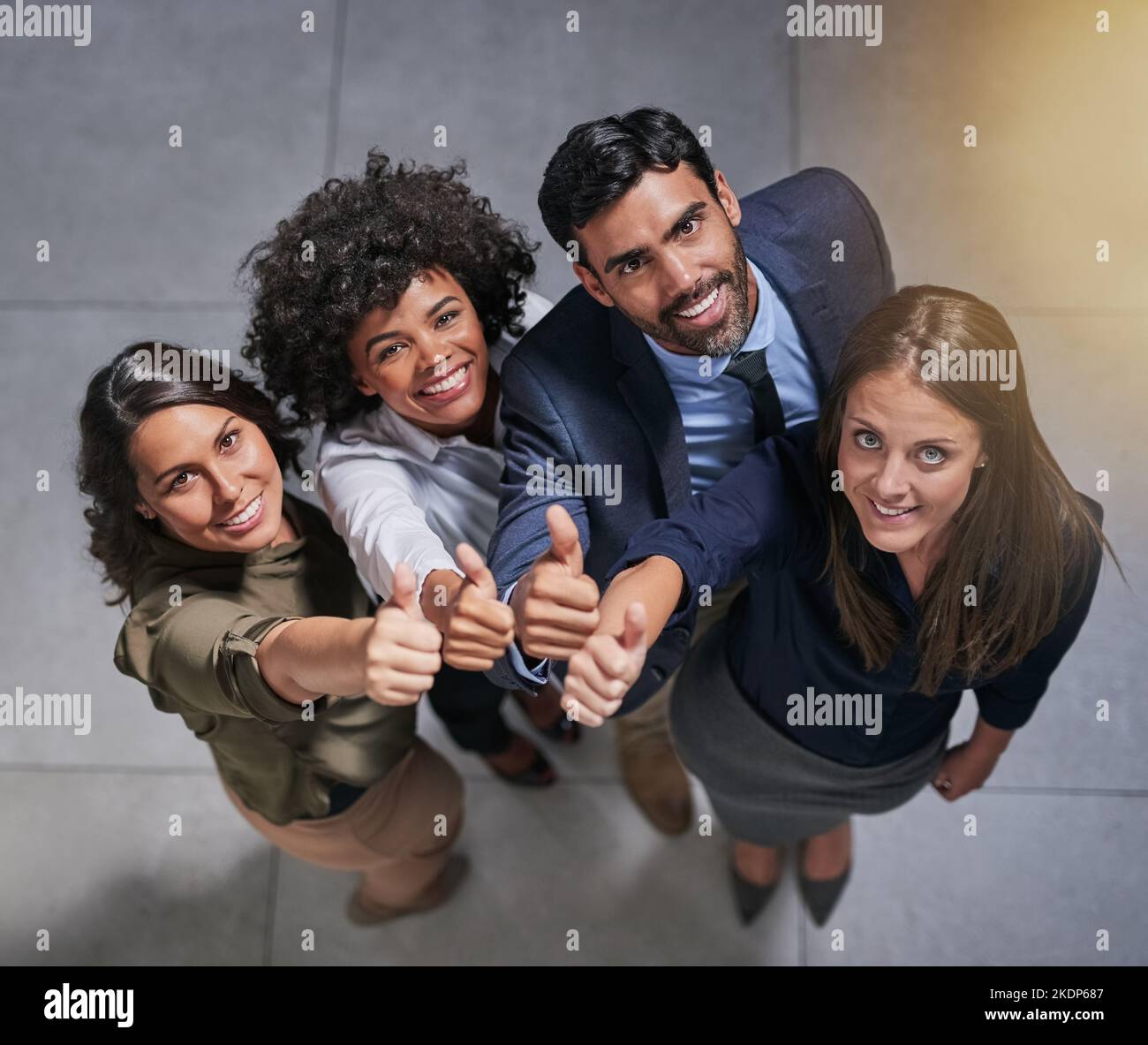 Were in it to win it. High angle portrait of a group of coworkers ...