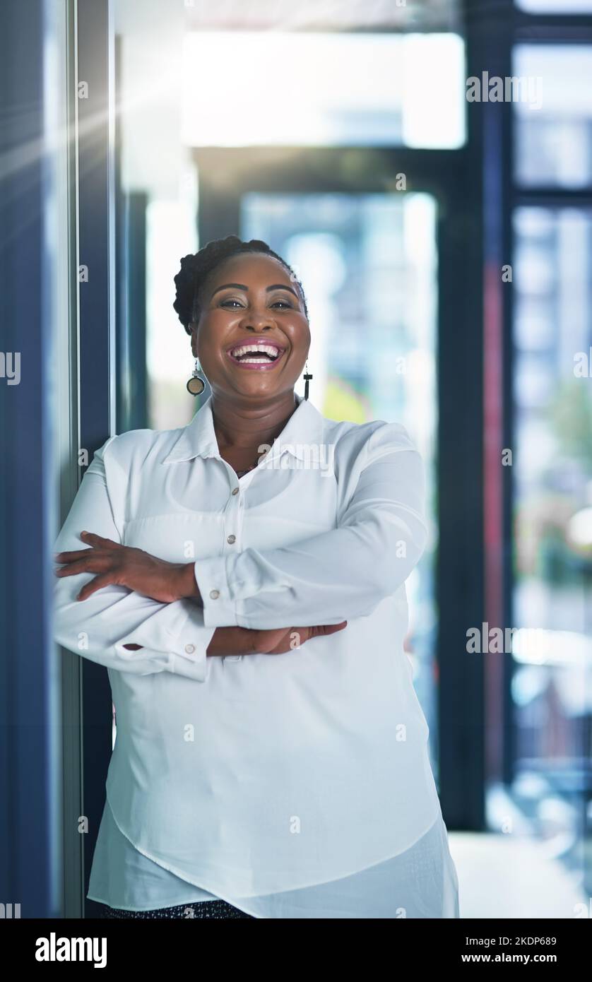 My job makes me happy every day. Portrait of a happy businesswoman ...