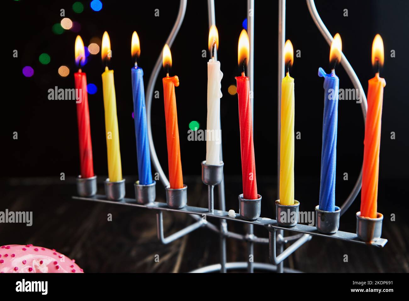 Jewish holiday Hanukkah background. A traditional dish is sweet donuts ...
