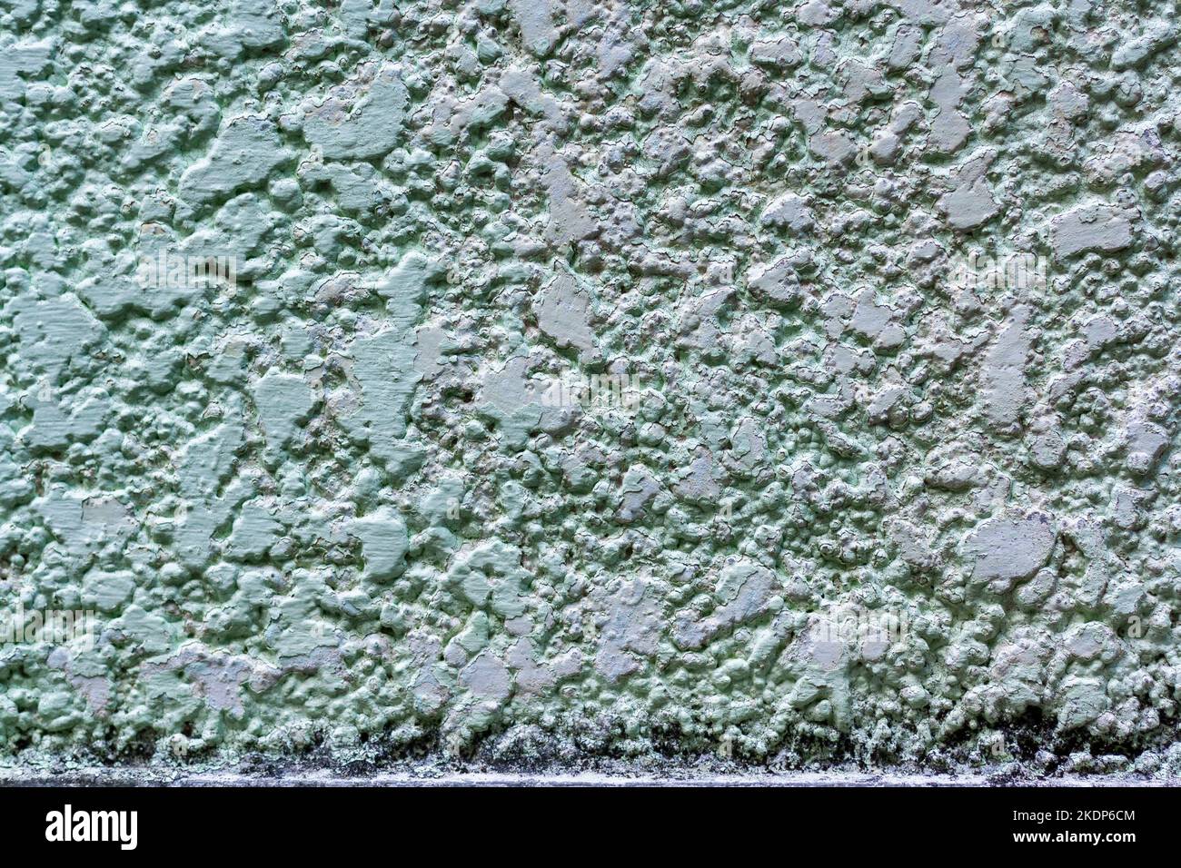 Old concrete wall painted in green. Horizontal image Stock Photo - Alamy