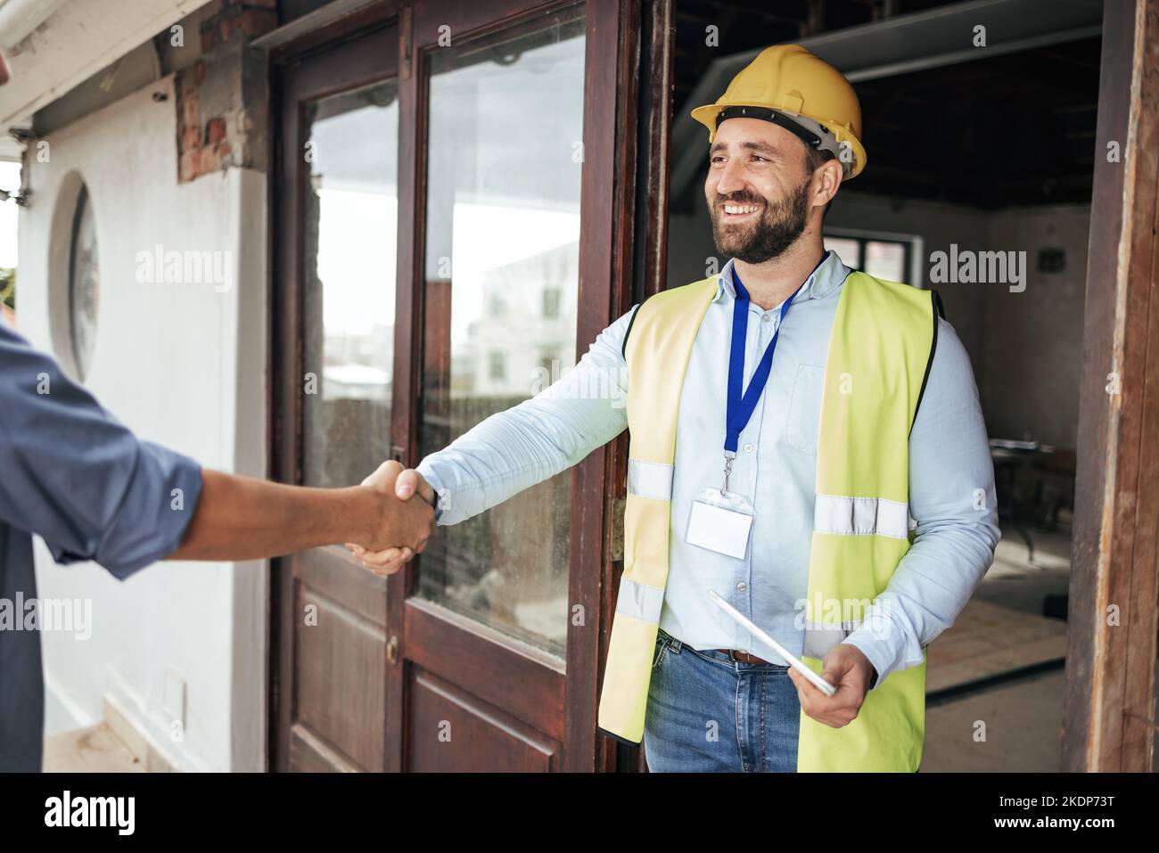 Construction, architect and handshake deal at building for professional ...