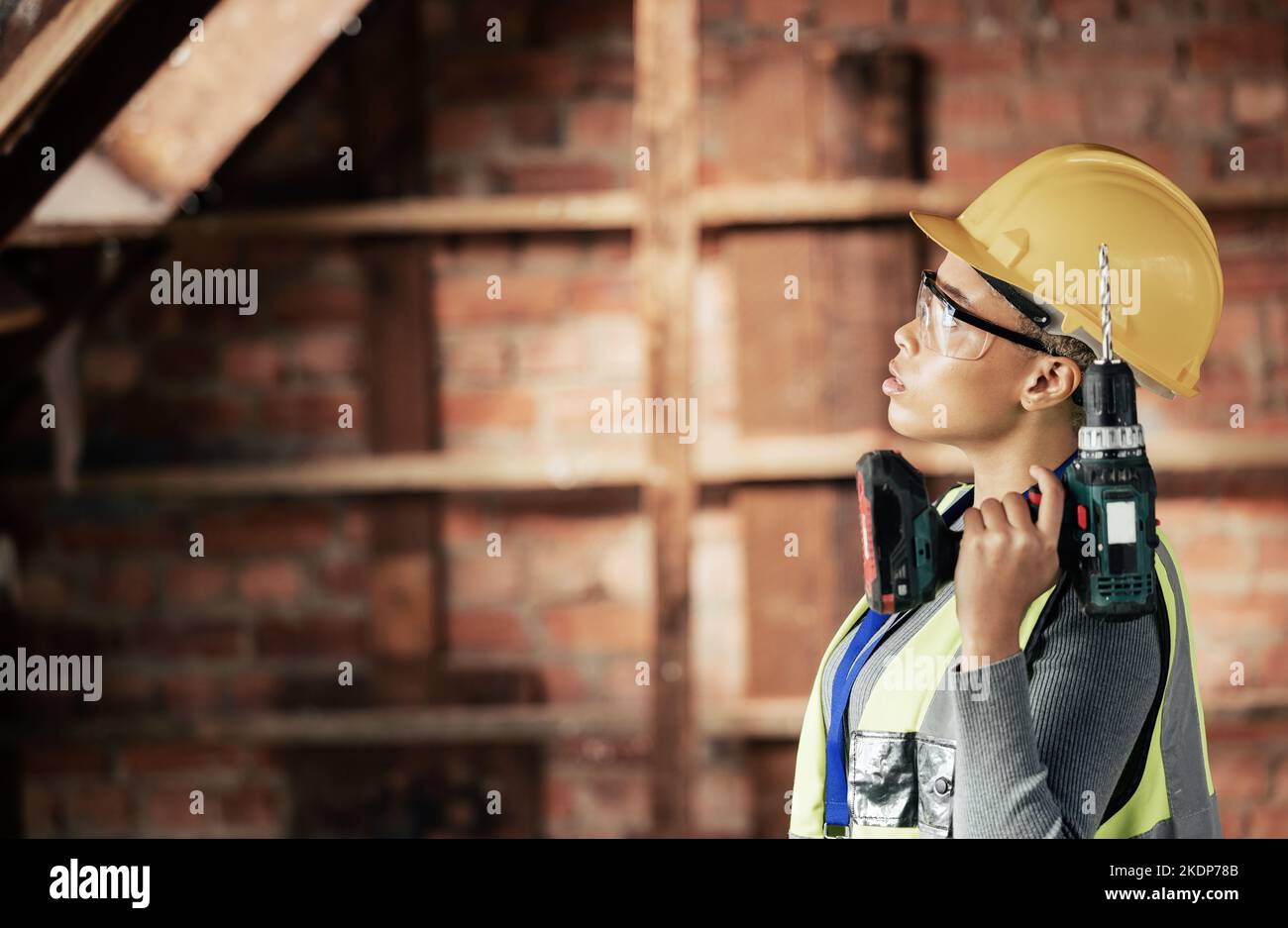 Woman, electric drill and engineer construction worker in building for ...