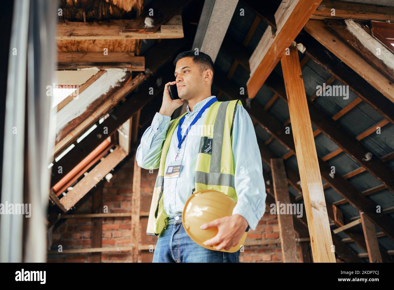 Engineering, phone call and man at a construction site working on an ...