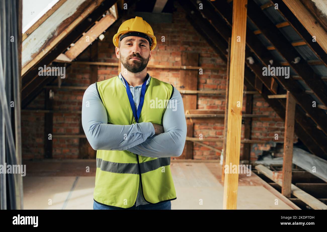 Construction worker, man or arms crossed in house or home and real ...