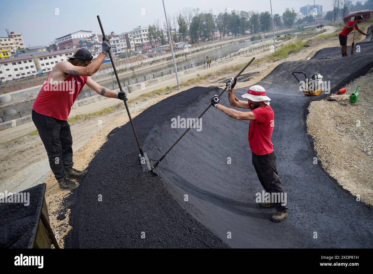 Kathmandu, NE, Nepal. 8th Nov, 2022. Volunteers build a pump track on a ...