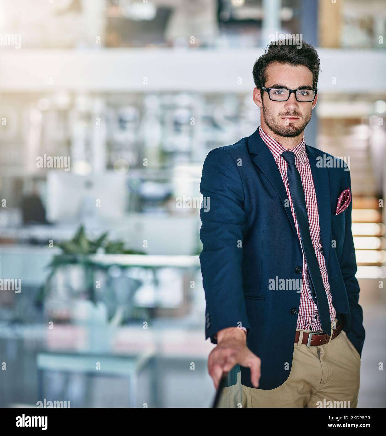Give him a suit and hell conquer the world. Portrait of a trendy young ...