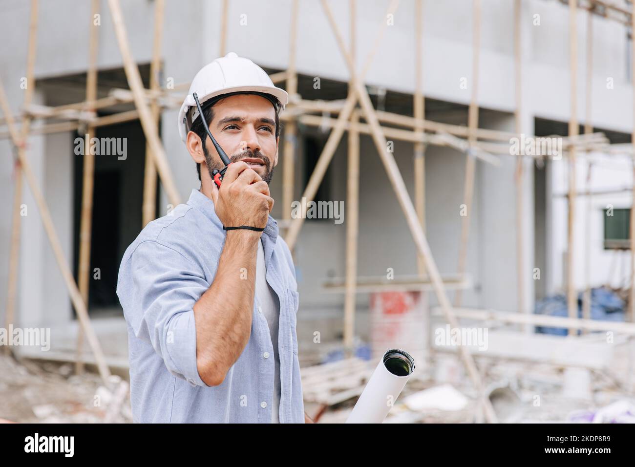 Hispanic latin indian builder work in construction site. Architect home ...