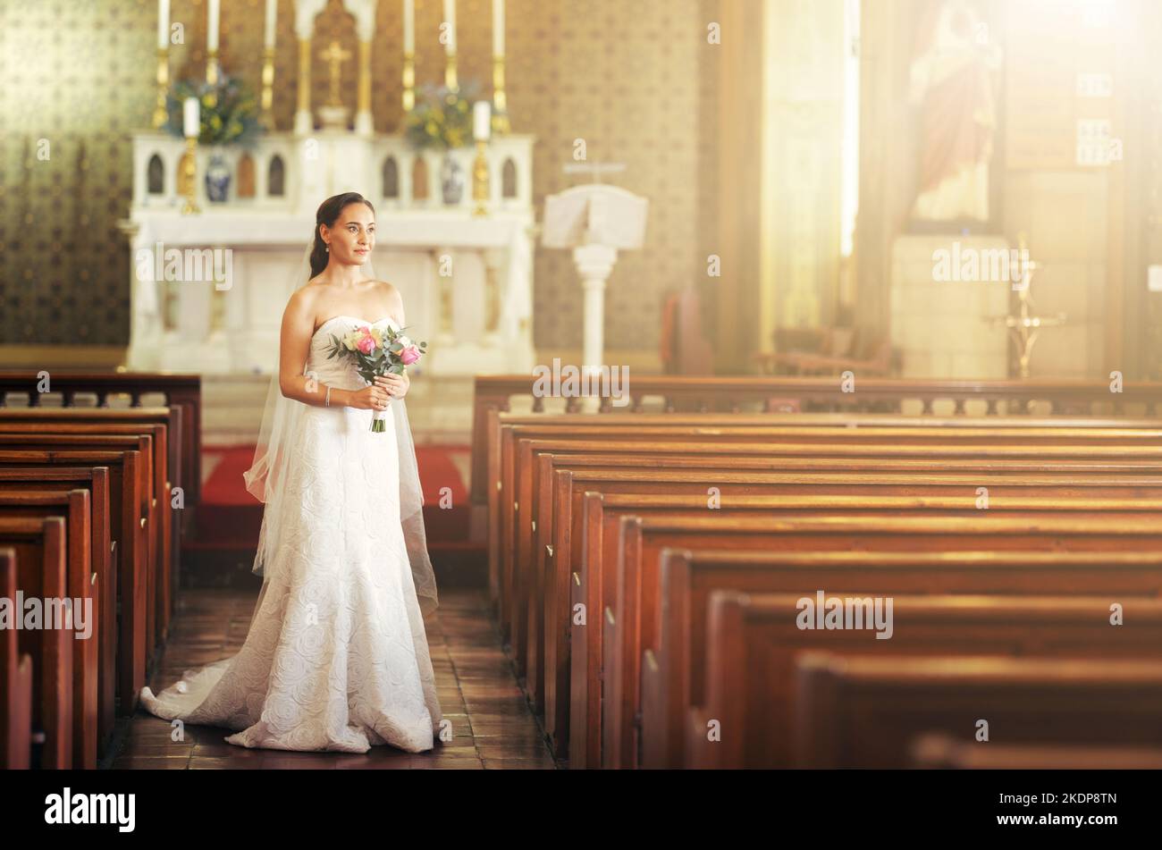 Wedding, bride and church with a woman holding flower bouquet while ...