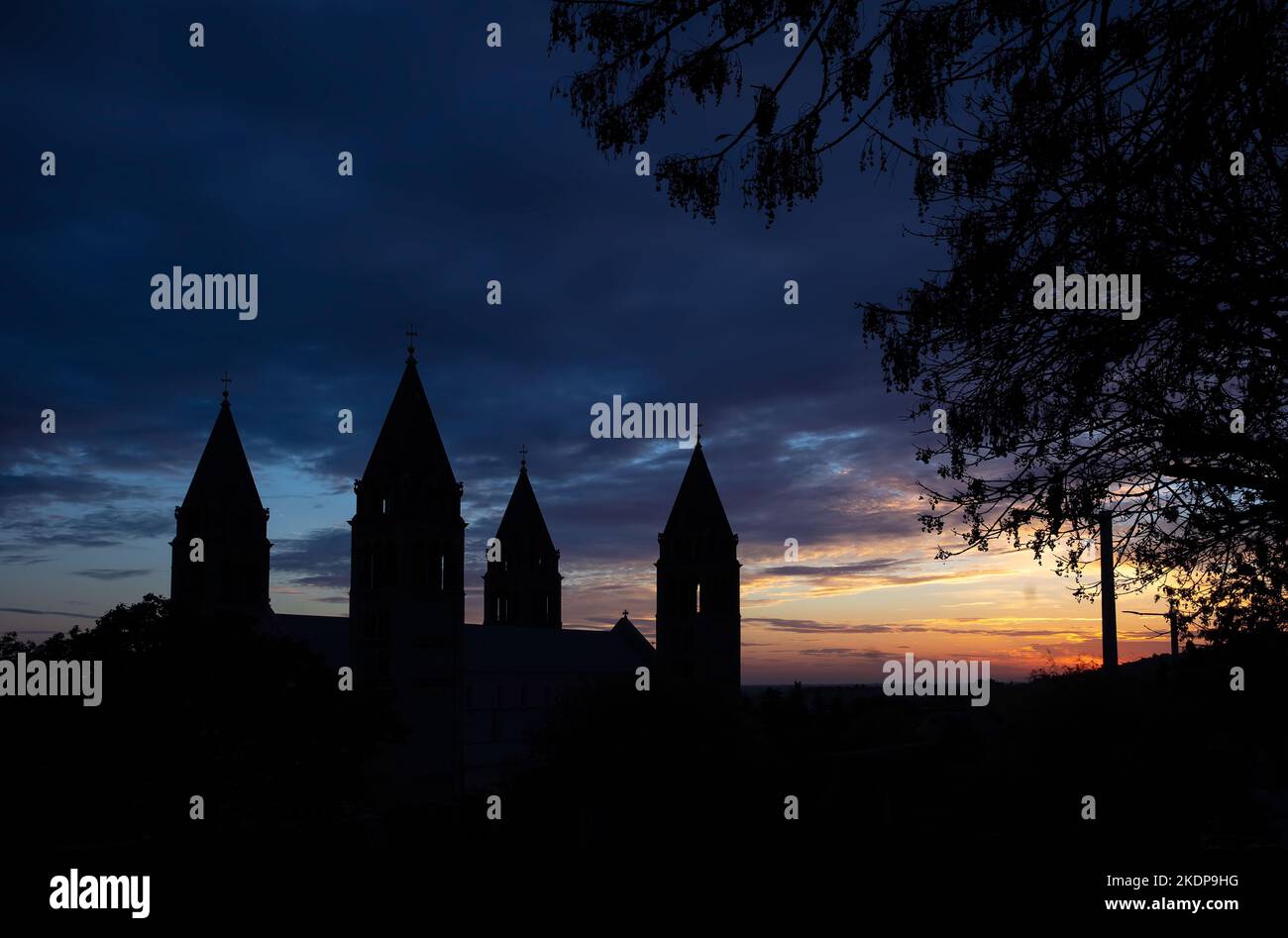 Four towers of christian cathedral at night in Pecs, Hungary Stock ...