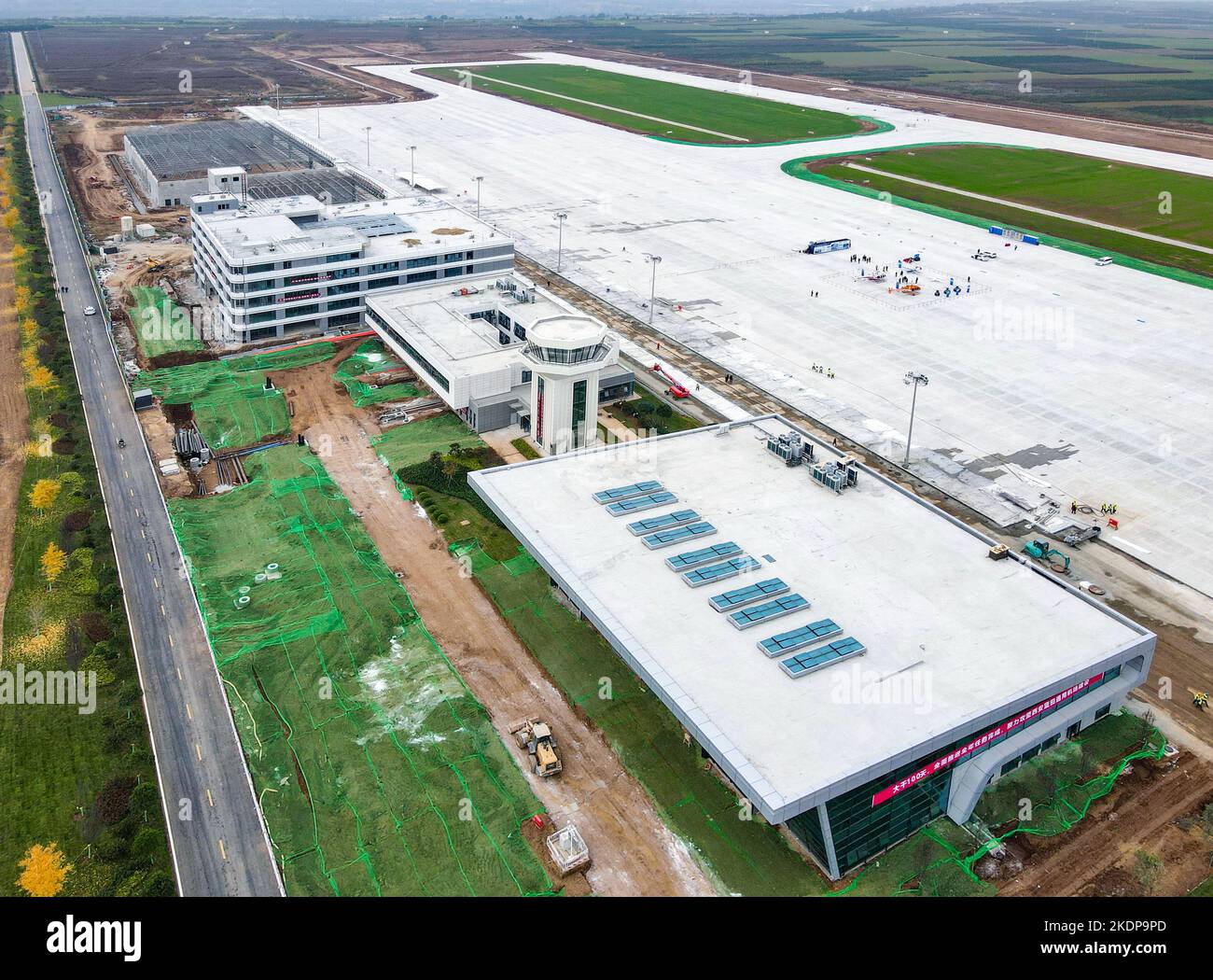 Aerial photos show the fixed base operator, flight support service ...