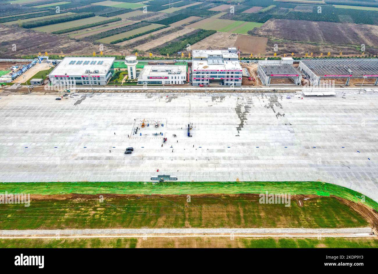 Aerial photos show the fixed base operator, flight support service ...