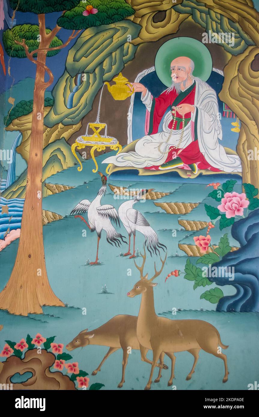 Colorful traditional wall painting representing Mitsering the Sage of ...