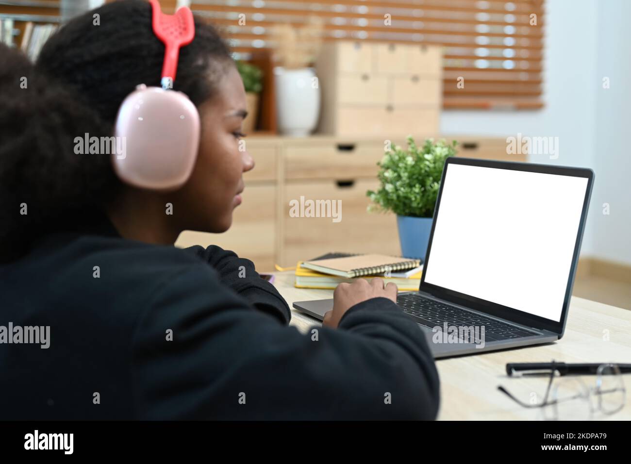 Student using headphone in classroom hi-res stock photography and ...