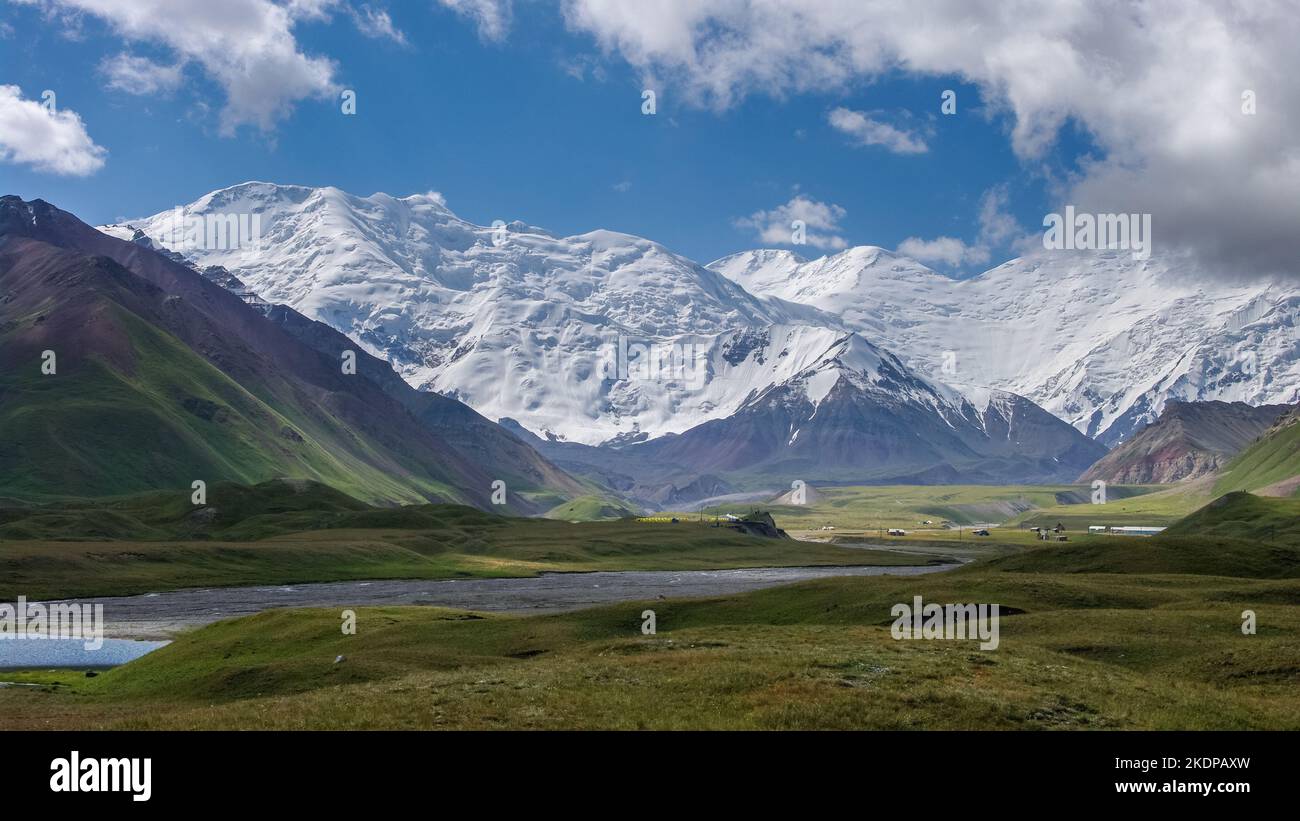 Scenic view of Achik Tash basecamp of Lenin Peak aka Ibn Sina Peak in ...