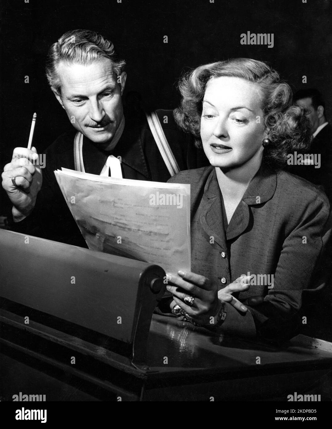 BETTE DAVIS on set candid going over dialogue during filming of JUNE ...