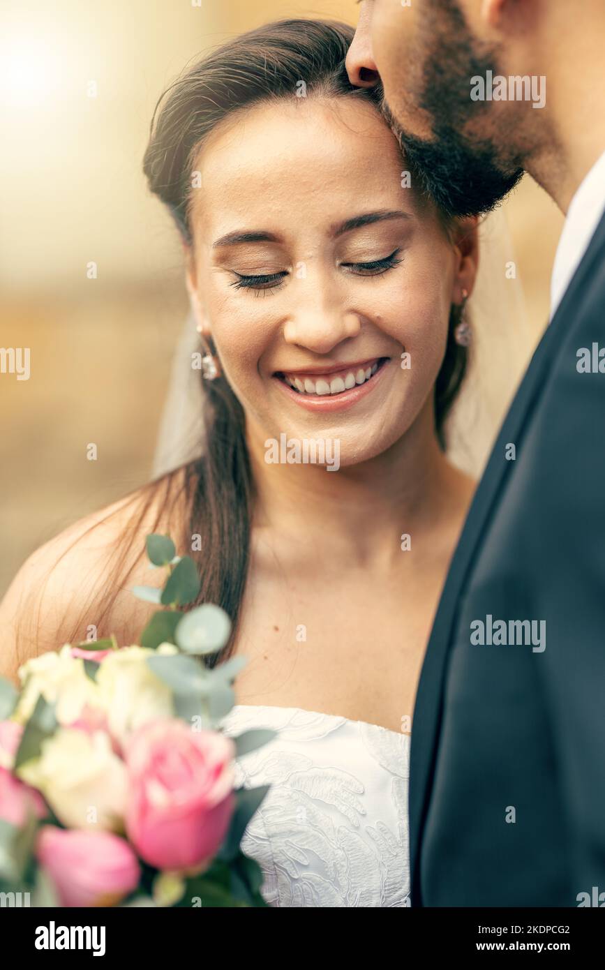 Love, marriage wedding and couple kiss from groom happy after partnership commitment, trust ...