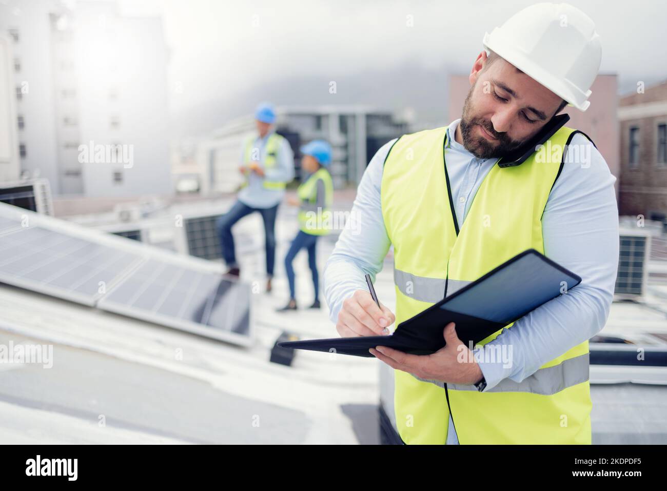 Solar energy, engineer phone call and man writing on solar roof working ...