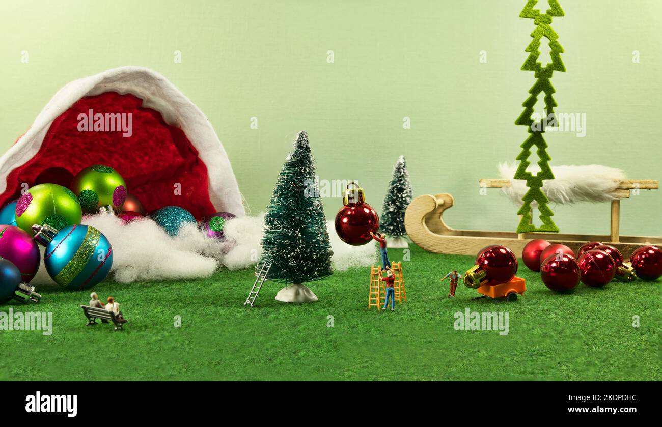 Christmas scene with decorating the Christmas tree Stock Photo - Alamy