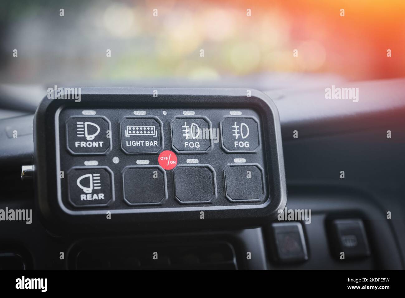 Additional dashboard panel in the car interior to control outdoor ...
