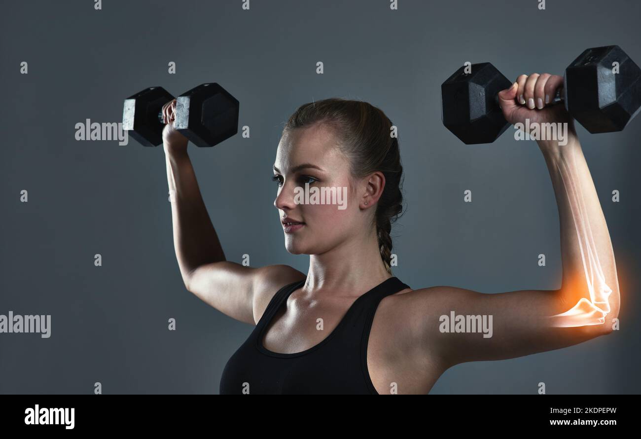 Youre only getting stronger. Studio shot of a sporty young woman ...