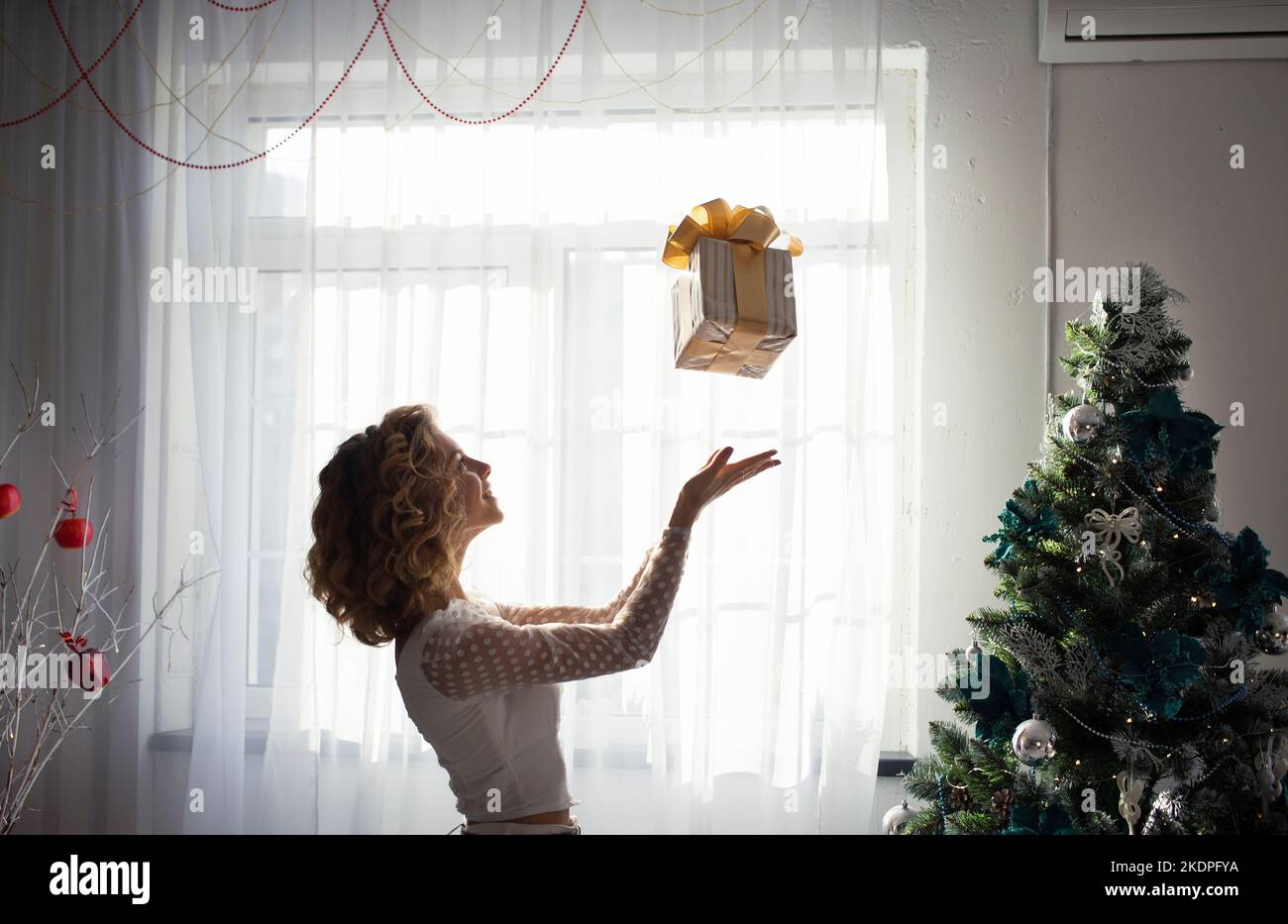 Old woman throws hi-res stock photography and images - Alamy