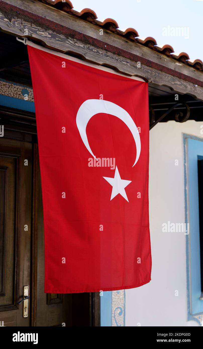 Turkish flag background. Red textile flag of Turkey on the streets of ...