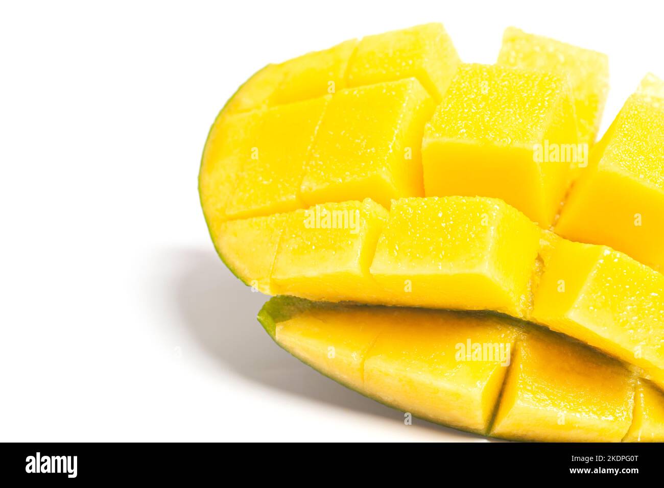 chopped half of ripe mango fruit isolated on white background Stock ...