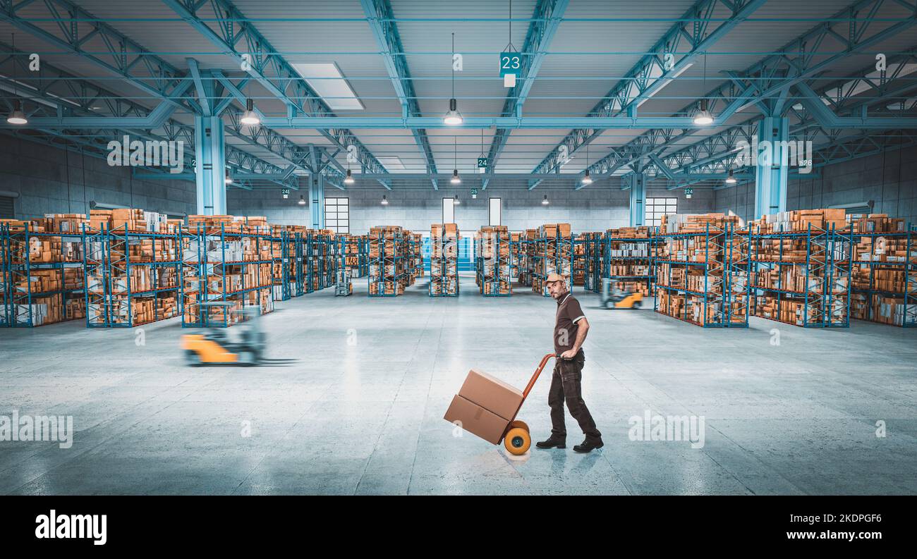 man with handtruck move in warehouse Stock Photo - Alamy