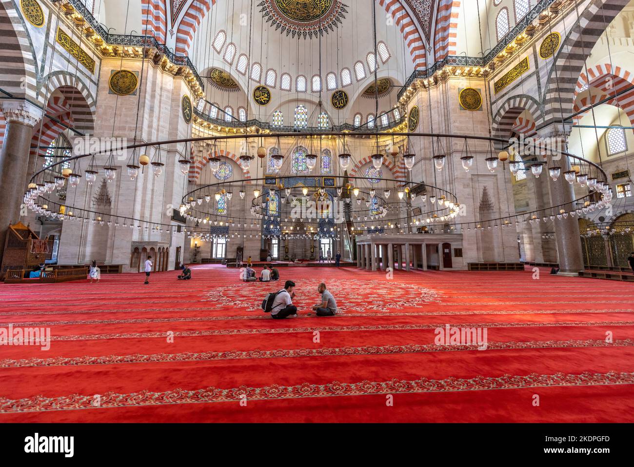 ISTANBUL/TURKEY - June 27, 2022: people sit and pray in suleymaniye ...