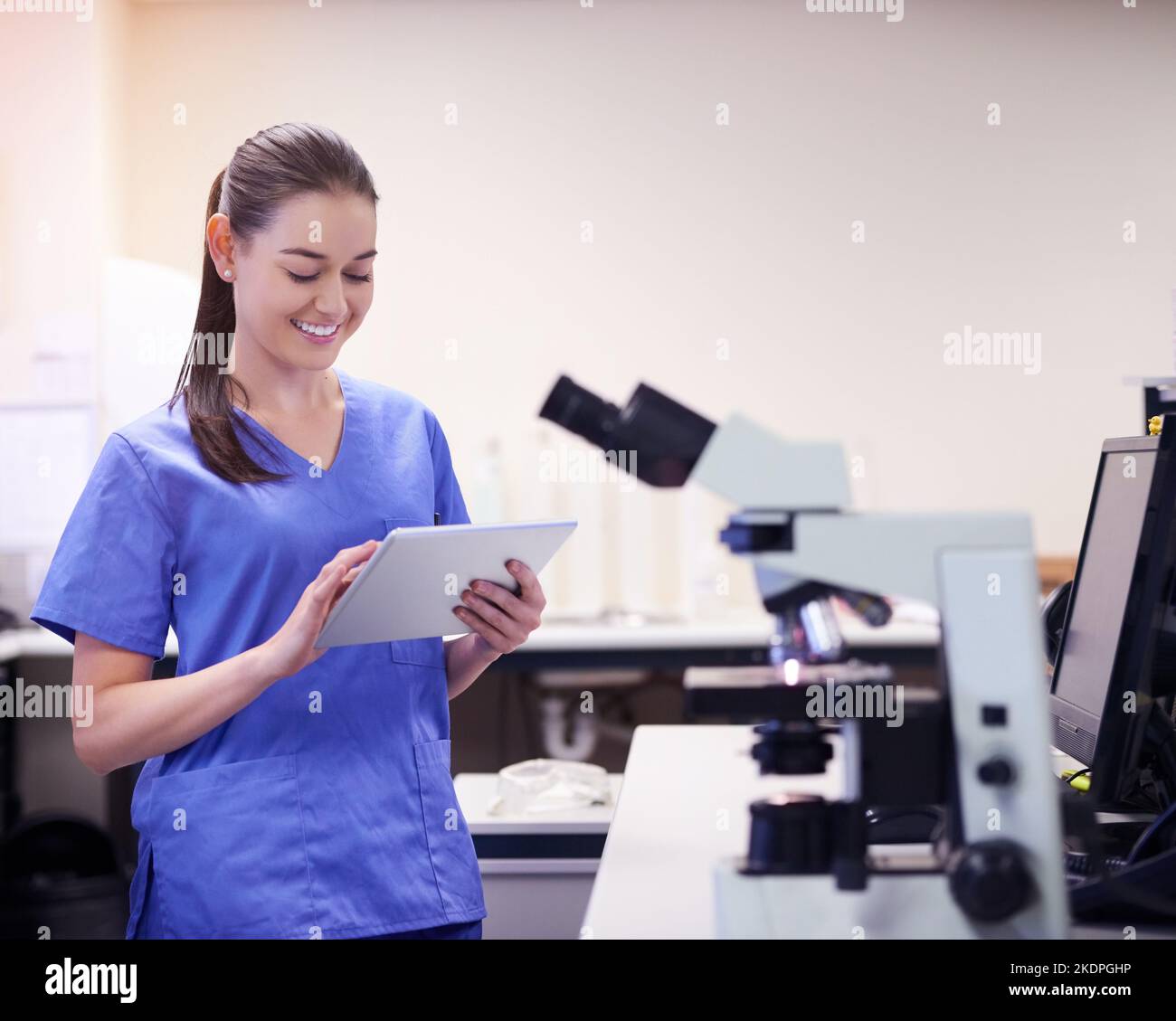 Making medical advances with modern technology. a young scientist using ...