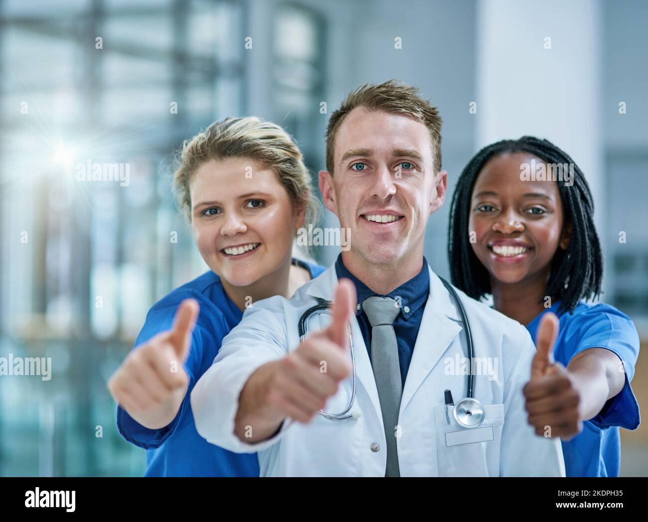 Good news, youre doing great. Portrait of a team of confident young ...