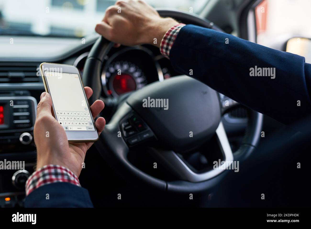 Right on course. an unrecognizable businessman using his cellphone ...
