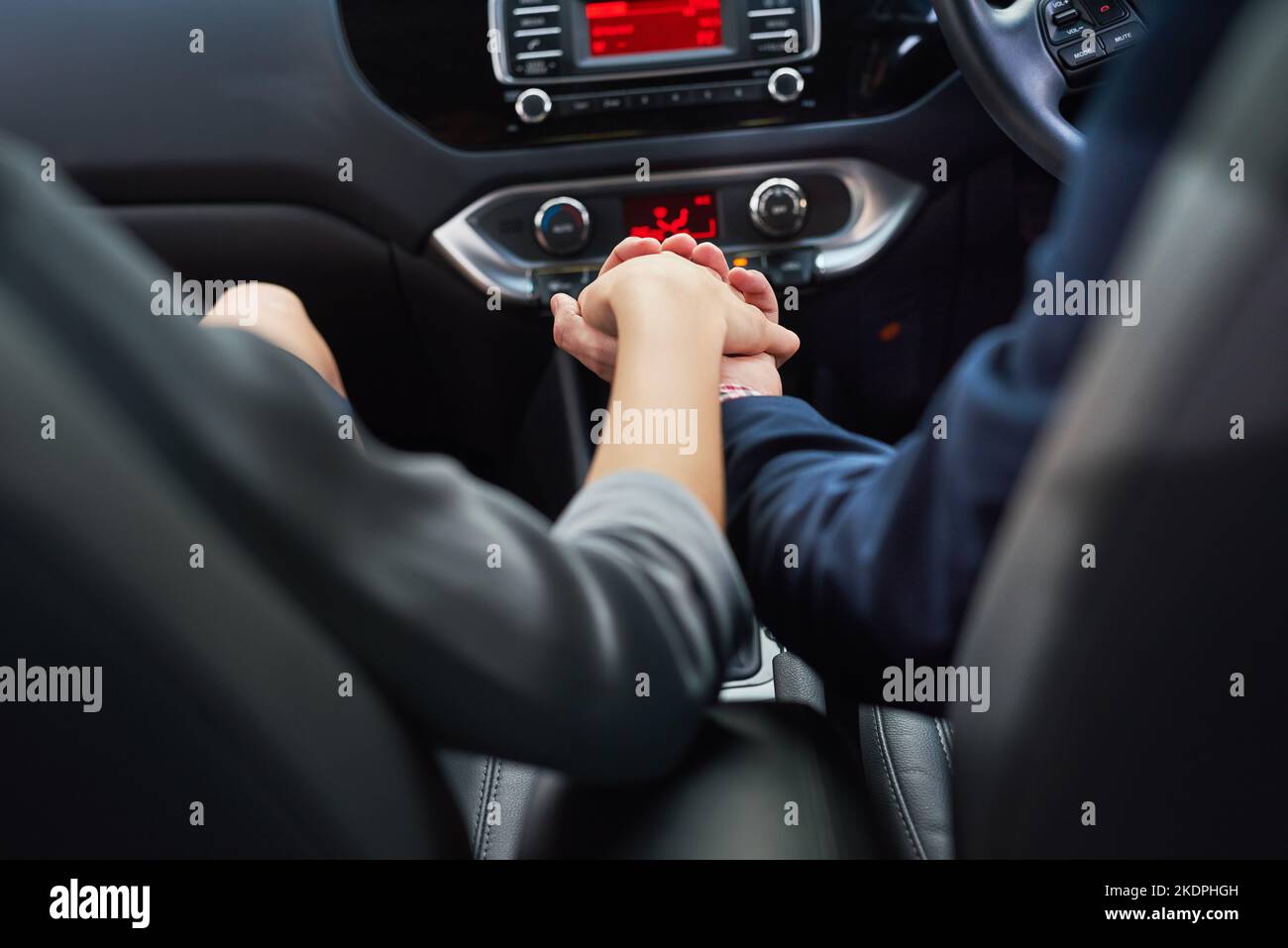 Love is a journey best traveled together. a couple holding hands while ...