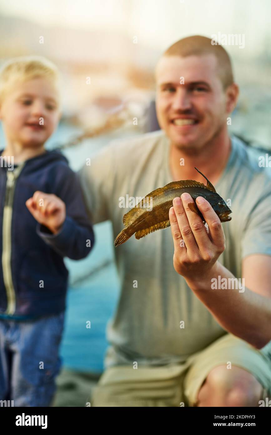 Man boy fishing hi-res stock photography and images - Alamy