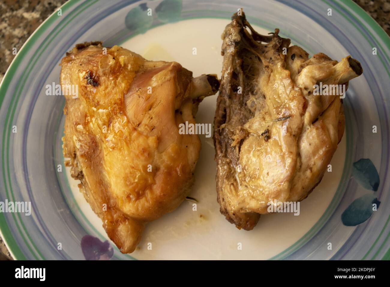 oven-roasted chicken overthighs Stock Photo - Alamy