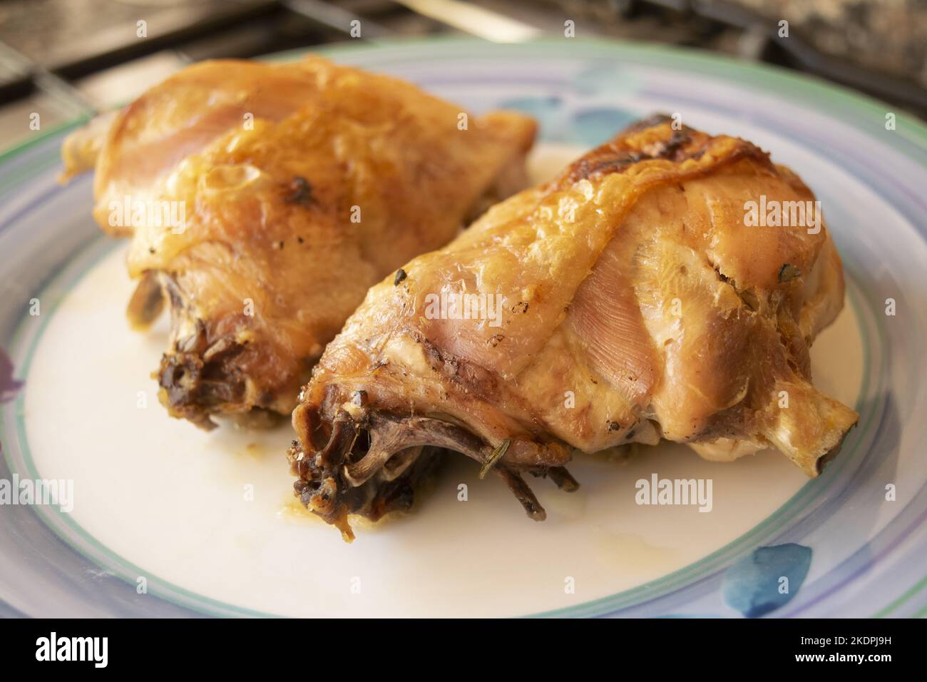 oven-roasted chicken overthighs Stock Photo - Alamy