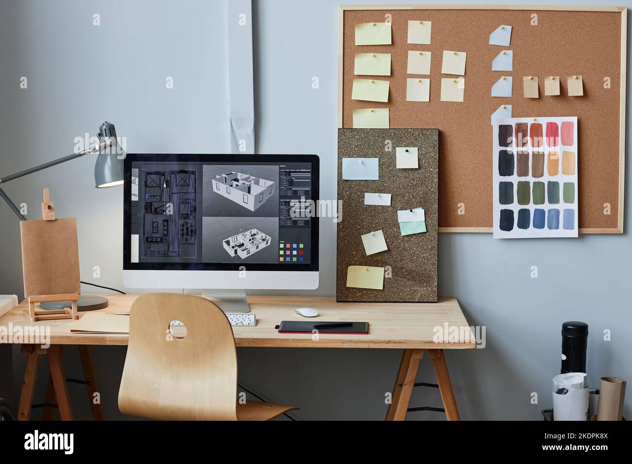 Background image of computer with 3D house model on screen at home ...