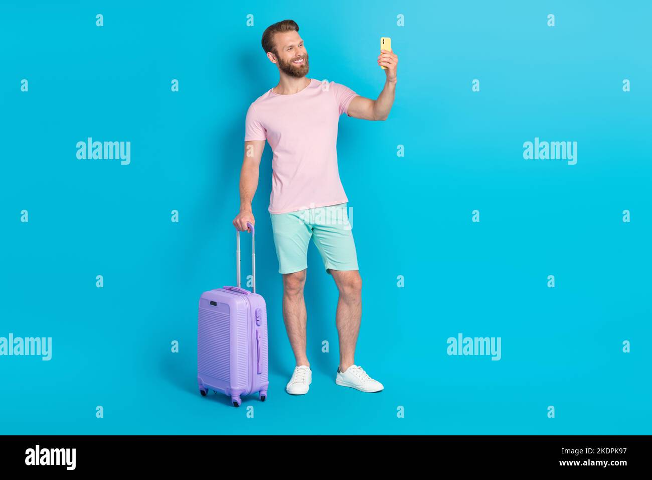 Full body photo of handsome young man influencer traveler take selfie ...