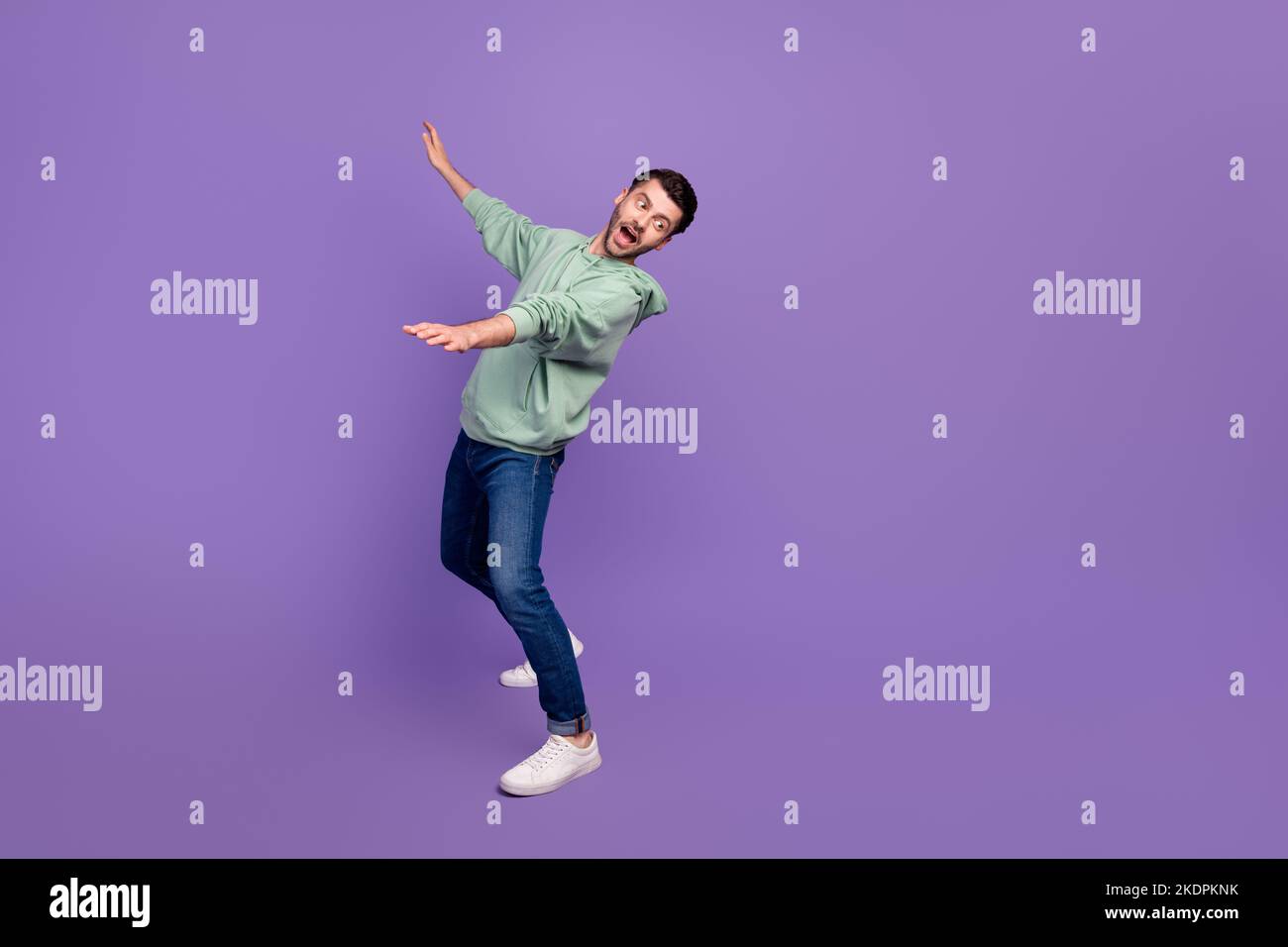 Full body length photo of young nervous funny man excited falling down ...