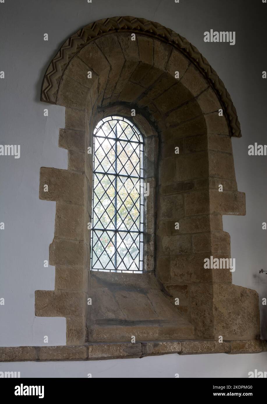 A Norman window in St. Laurence`s Church, Oxhill, Warwickshire, England ...