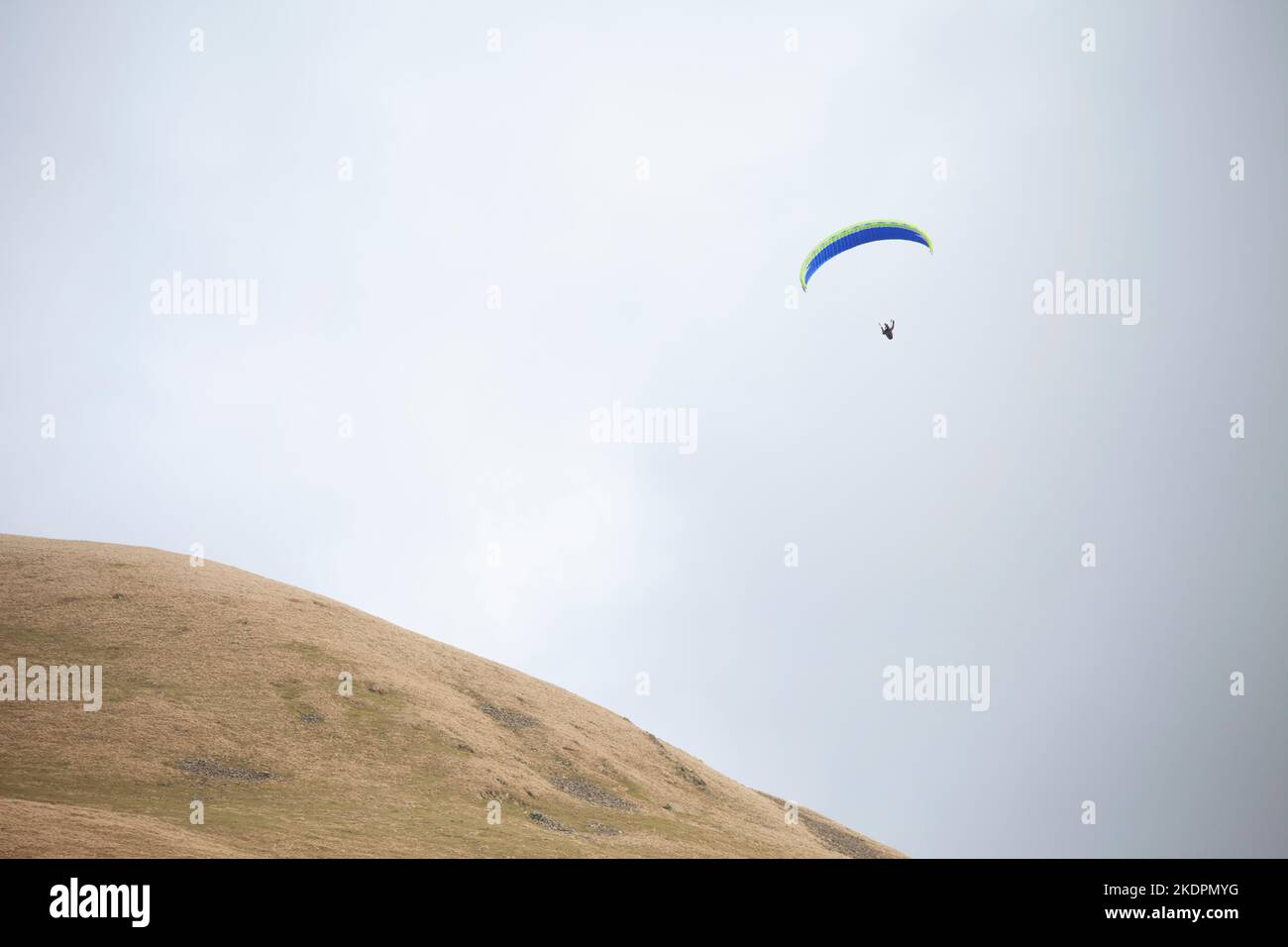 Paragliding through the Cumbrian skies with a back drop of scenic ...