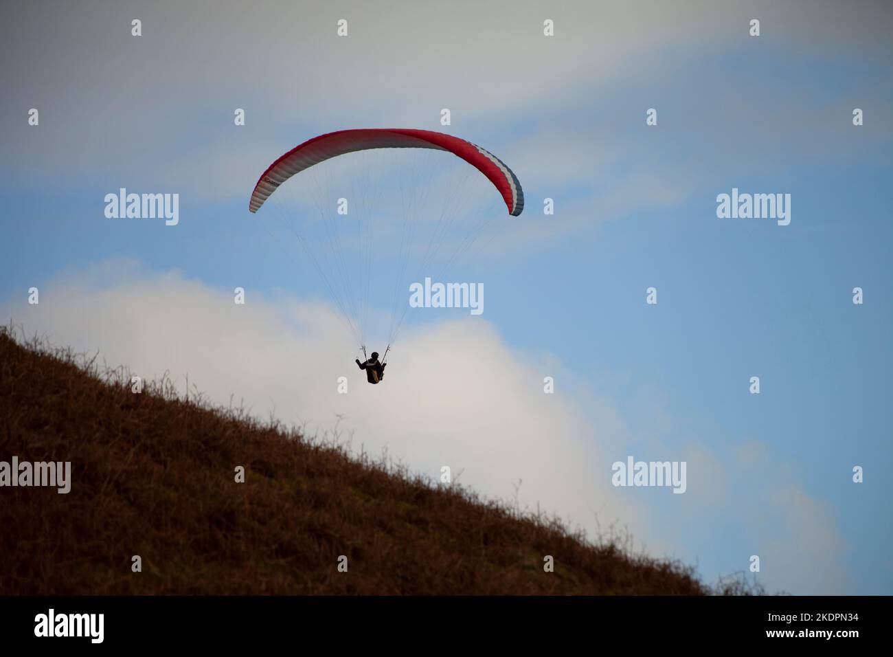 Paragliding through the Cumbrian skies with a back drop of scenic ...