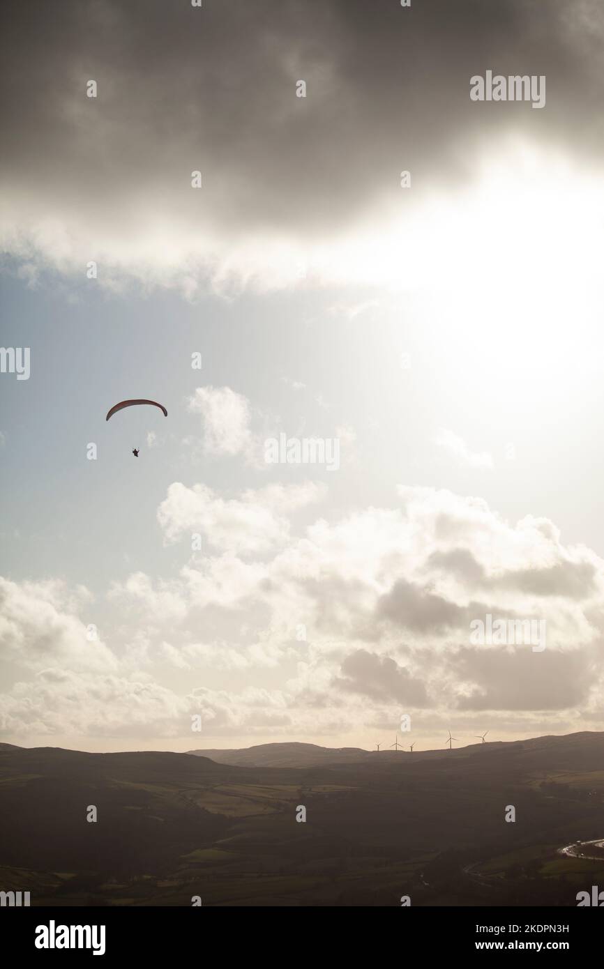 Paragliding through the Cumbrian skies with a back drop of scenic ...