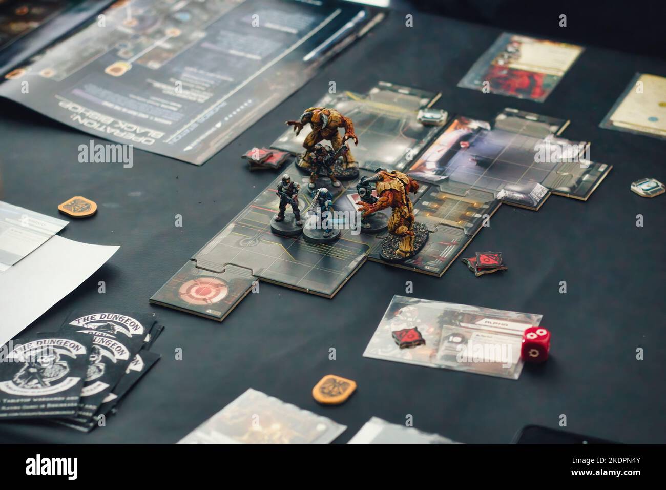 Plastic painted miniatures on game tiles from the Doom RPG board game ...