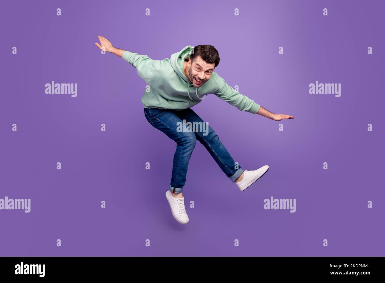 Full length profile portrait of satisfied glad person jumping toothy ...