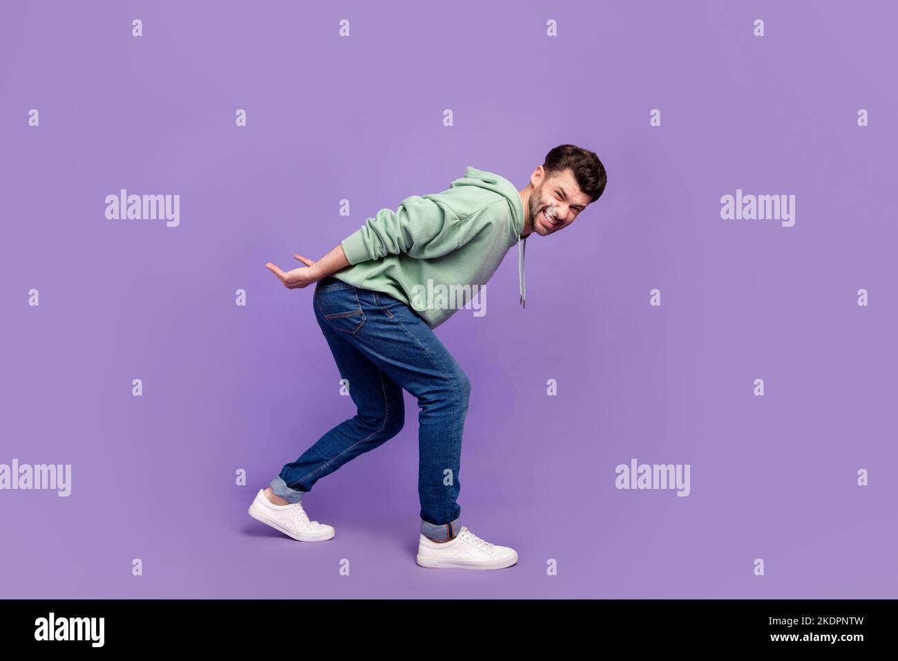 Full size photo of handsome young man carry back heavy object stressed ...