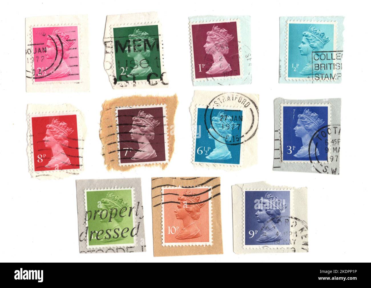 A montage of vintage postage stamps on paper from the United Kingdom ...