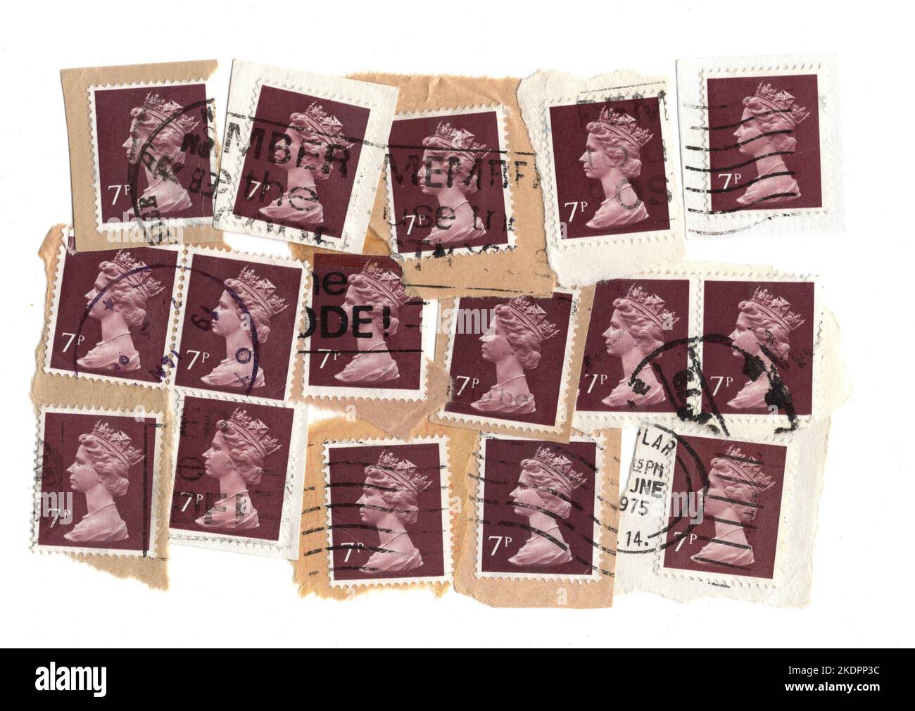 A montage of vintage postage stamps on paper from the United Kingdom ...